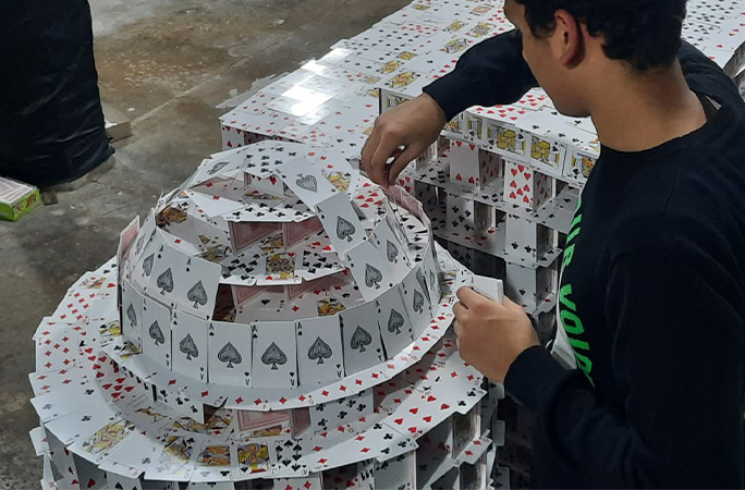 Teen stacks 143,000 playing cards to create world’s largest card ...