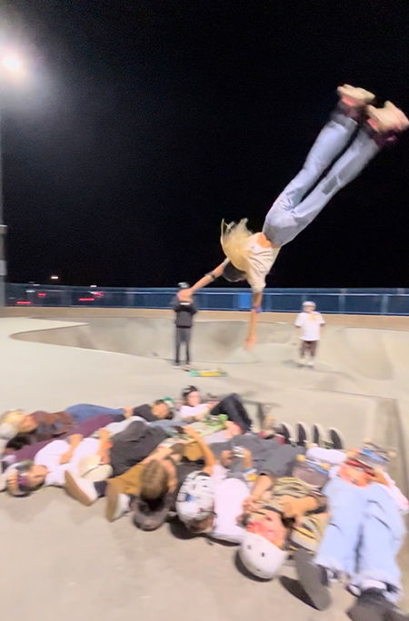 Mia sets epic roller-skating record by flipping over 12 PEOPLE ...