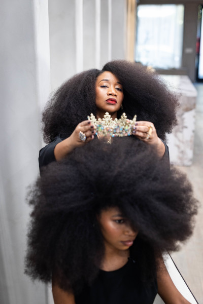 A brand-new record breaker with the world’s LARGEST AFRO takes the ...